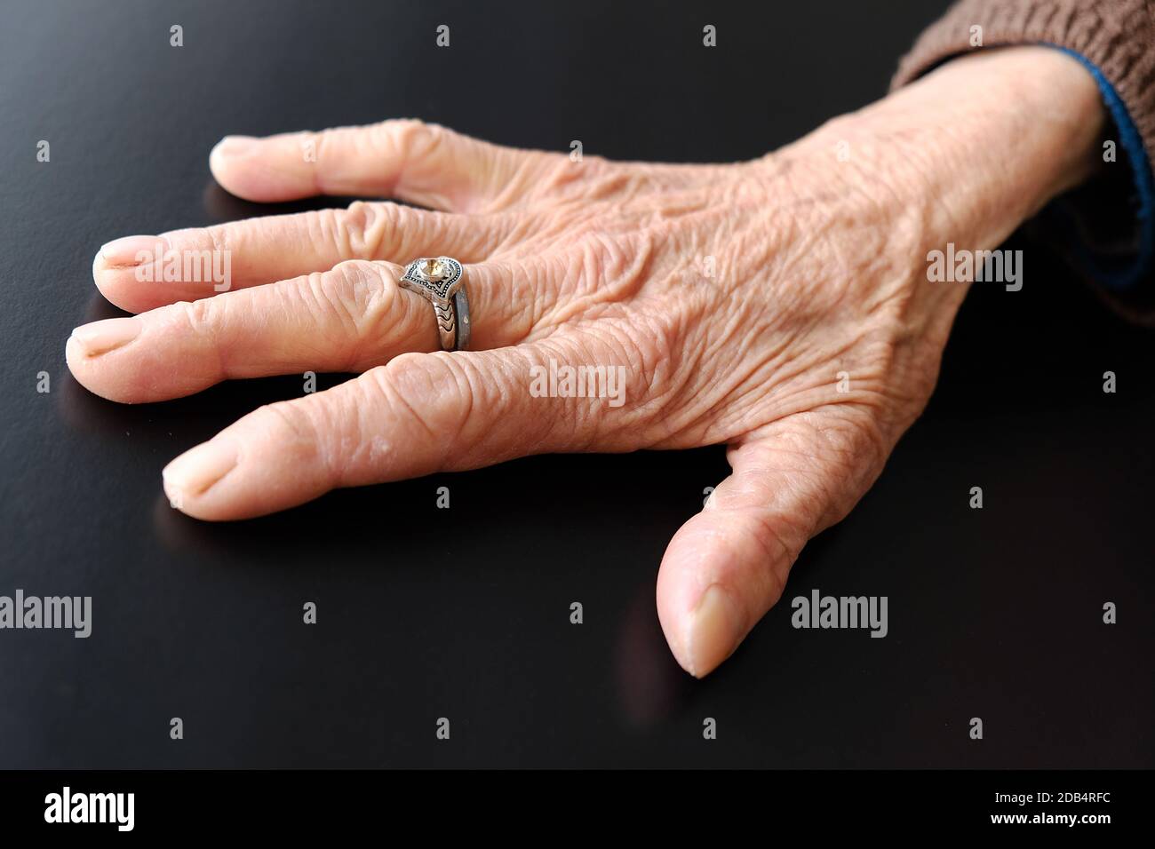 80 years old woman's hand, old human hand with veinsvery old human hand ...