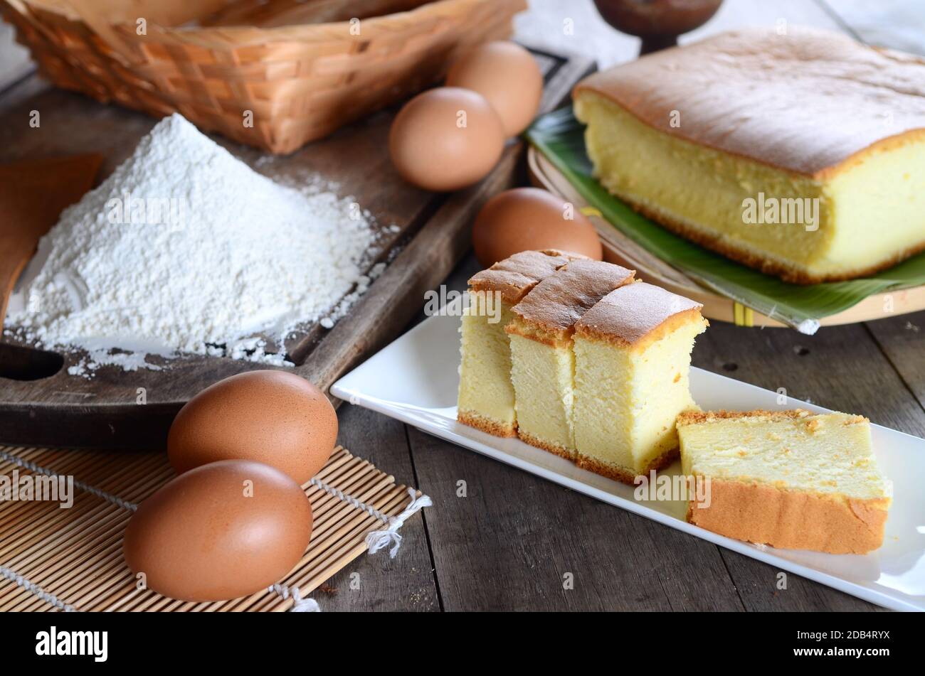 Taiwanese traditional sponge cake on white plate and wooden board Stock ...