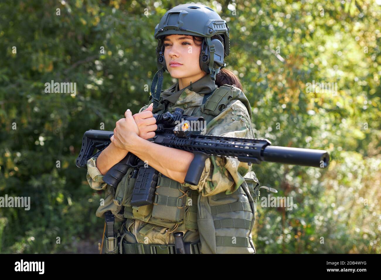 Young woman aiming with hunting rifle hi-res stock photography and ...