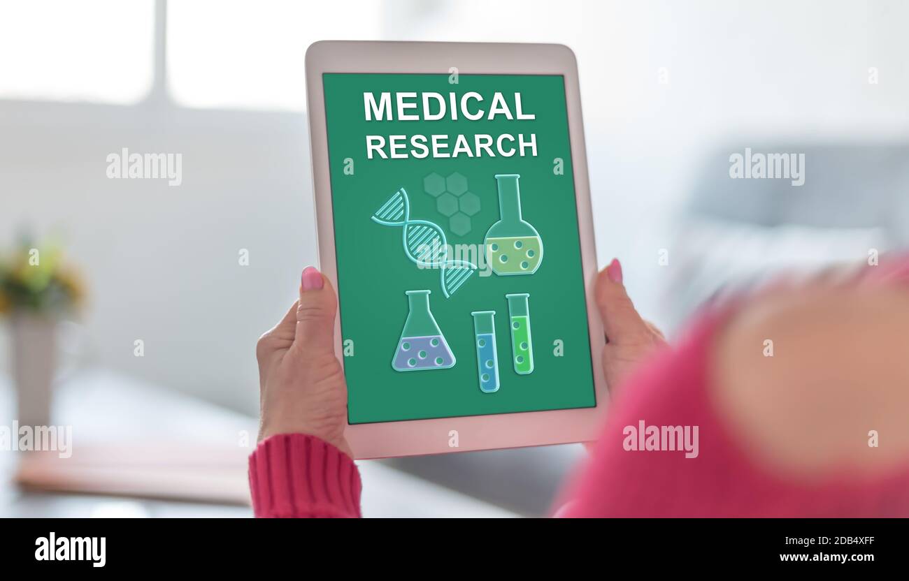 Tablet screen displaying a medical research concept Stock Photo - Alamy