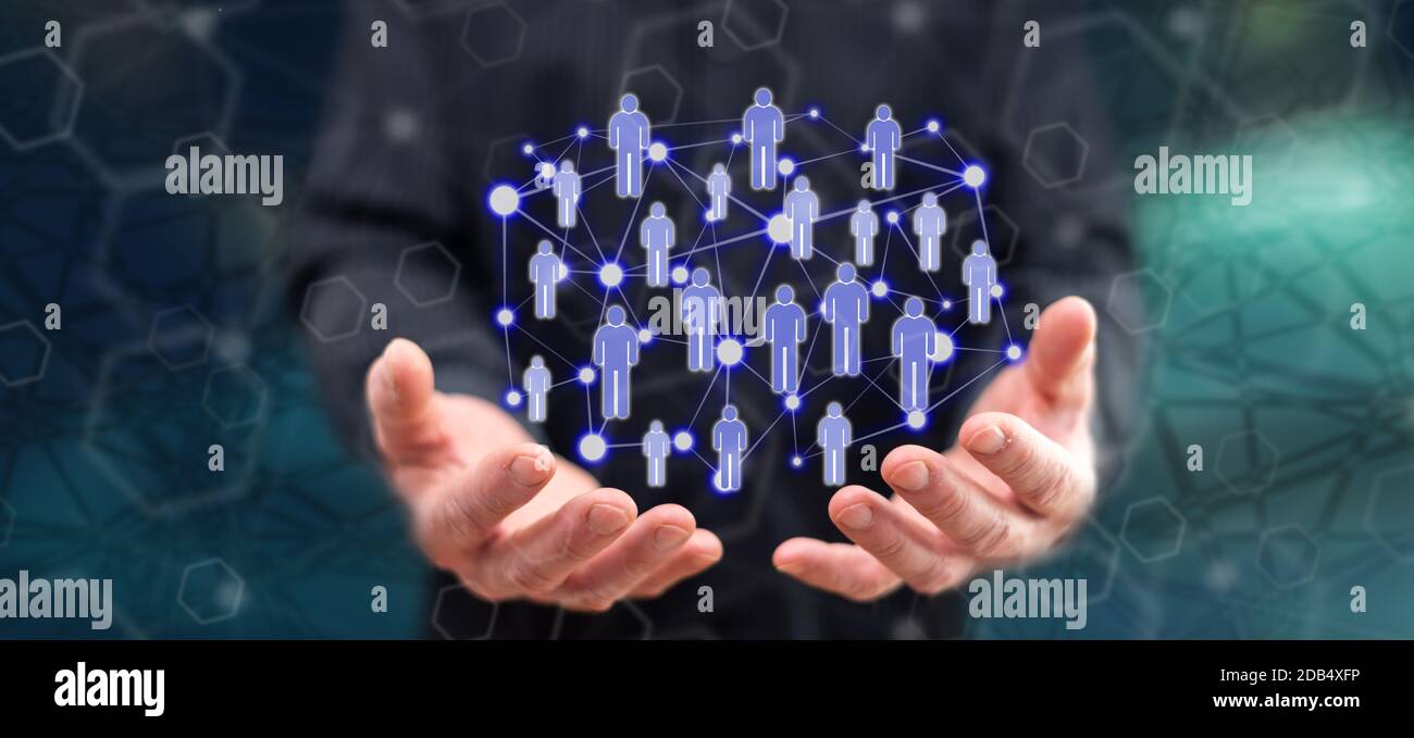 Social network concept above the hands of a man in background Stock ...