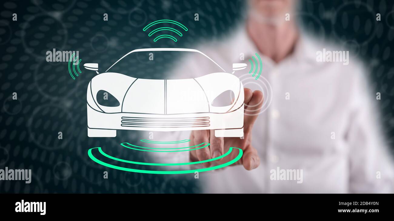 Man touching a smart car concept on a touch screen with his finger ...