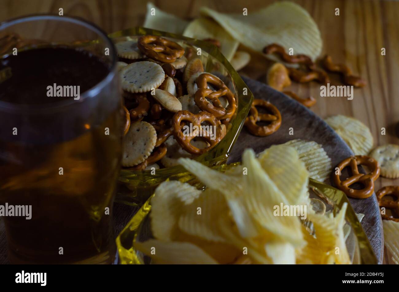 Cold beer snacks and potato chips Stock Photo - Alamy