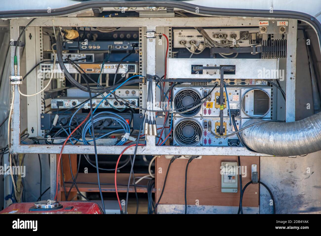 The transmitting car with a satellite antenna on the roof ensures the ...