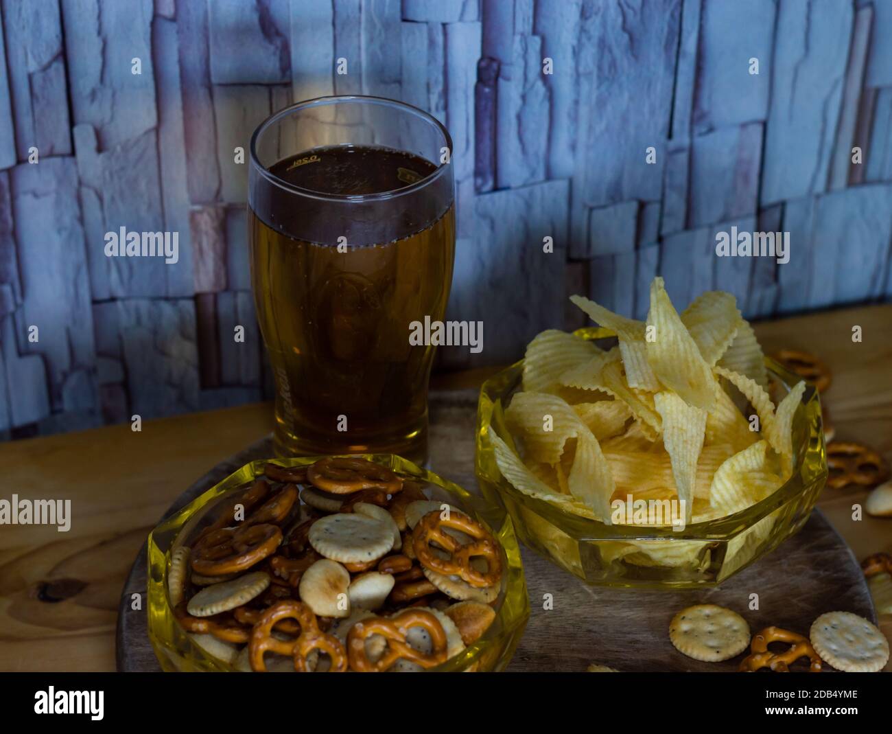 Cold beer snacks and potato chips Stock Photo - Alamy