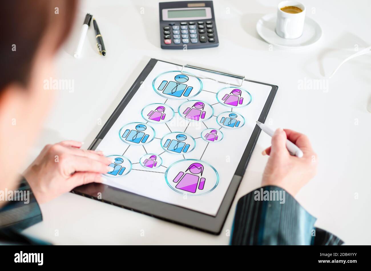 Woman looking at a social network concept Stock Photo - Alamy