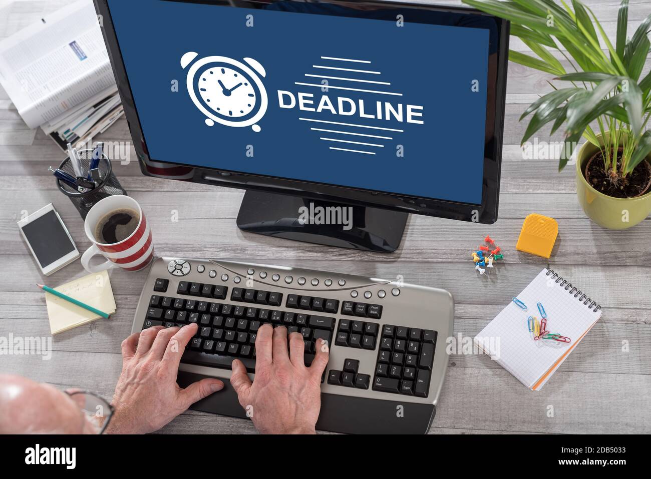 Man using a computer with deadline concept on the screen Stock Photo ...
