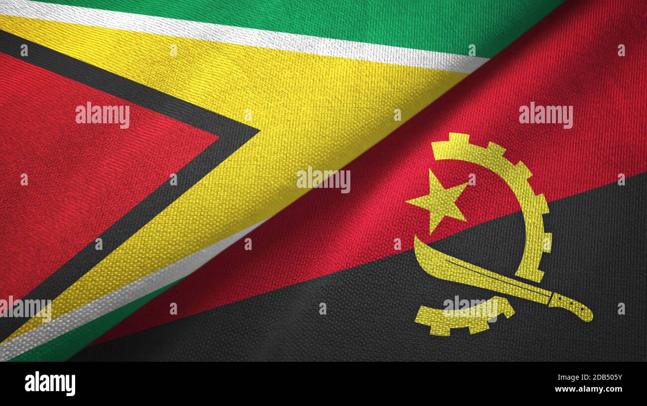 Guyana and Angola two flags textile cloth, fabric texture Stock Photo ...