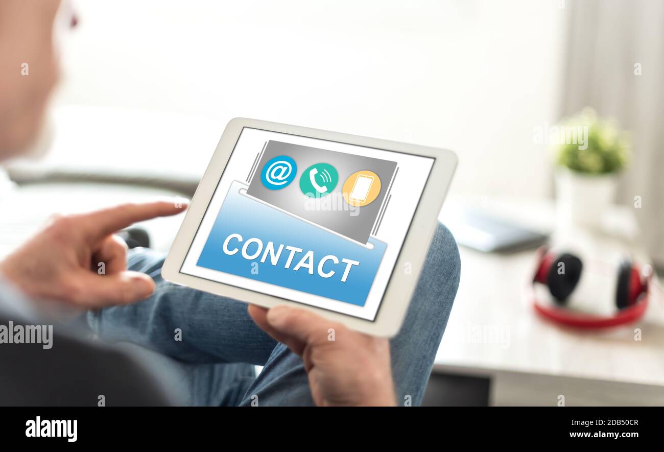 Tablet screen displaying a contact concept Stock Photo - Alamy
