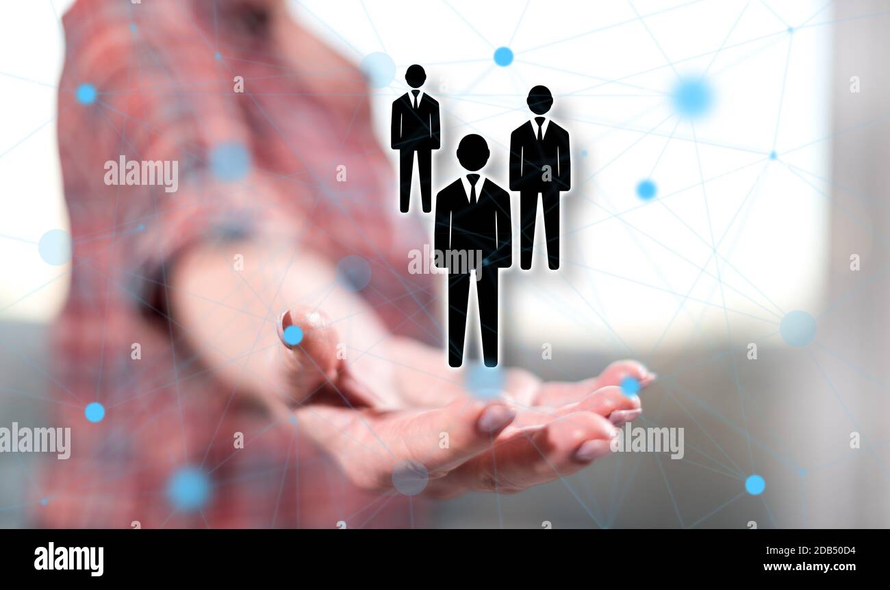 Business partner concept above the hand of a woman in background Stock ...
