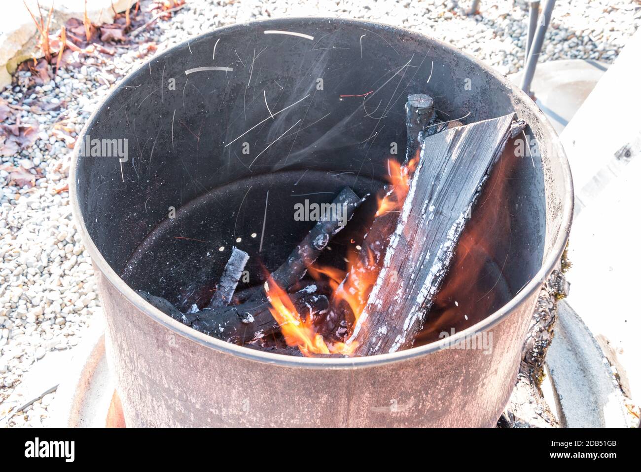 Burning waste in drum hi-res stock photography and images - Alamy