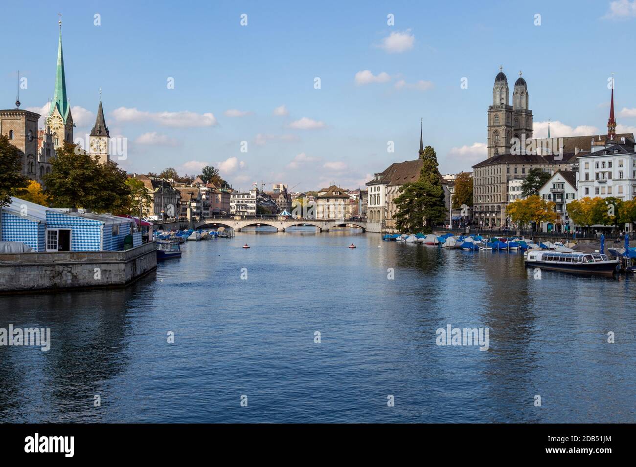 view at the waterfront of Limmat river in Zurich, Switzerland with ...