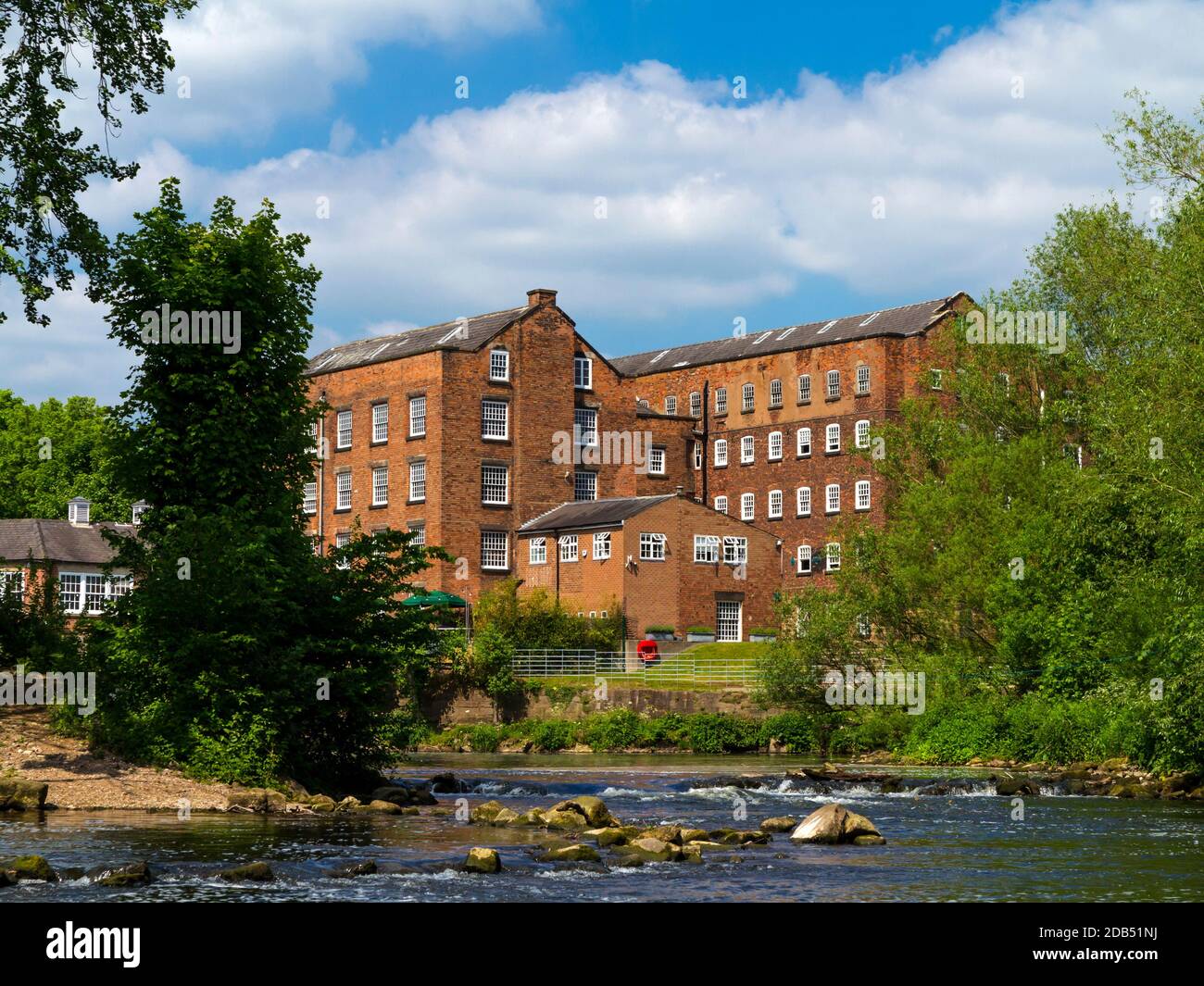 The River Derwent and Boars Head Mills at Darley Abbey a village near ...
