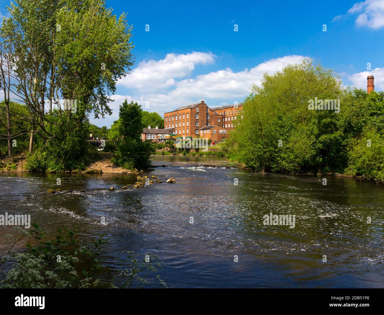 The River Derwent and Boars Head Mills at Darley Abbey a village near ...
