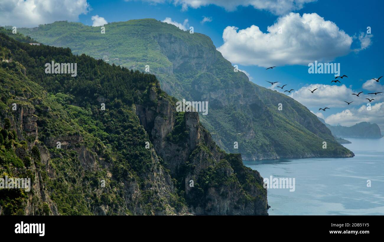 Steep, rocky cliffs along the Amalfi coast in Italy Stock Photo - Alamy