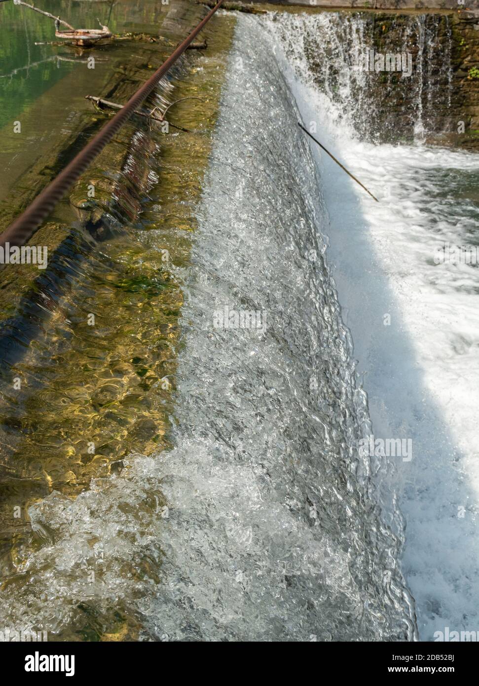Water flowing over the crest of the dam hi-res stock photography and ...