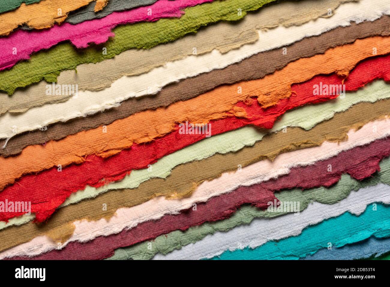 collection of colorful handmade Indian paper sheets with rough edges ...