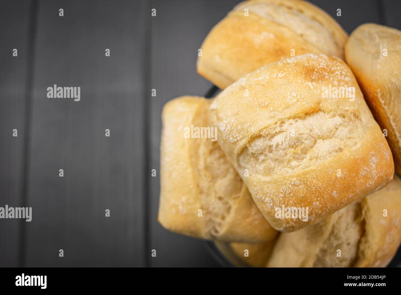Fresh bread stacked in a column, golden and crisp, freshly made Stock ...