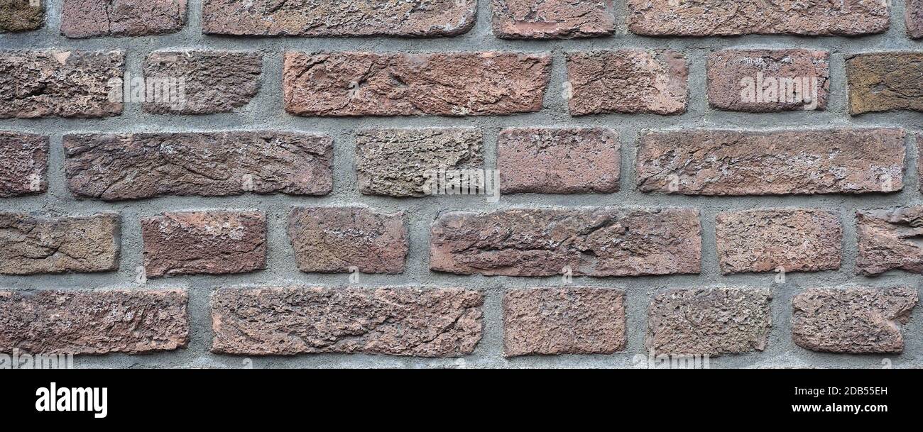 Dark red brick wall hi-res stock photography and images - Alamy