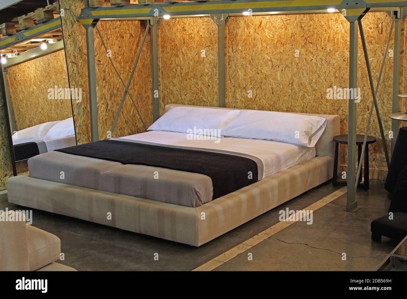 Big Bed in Distribution Warehouse Interior Stock Photo - Alamy