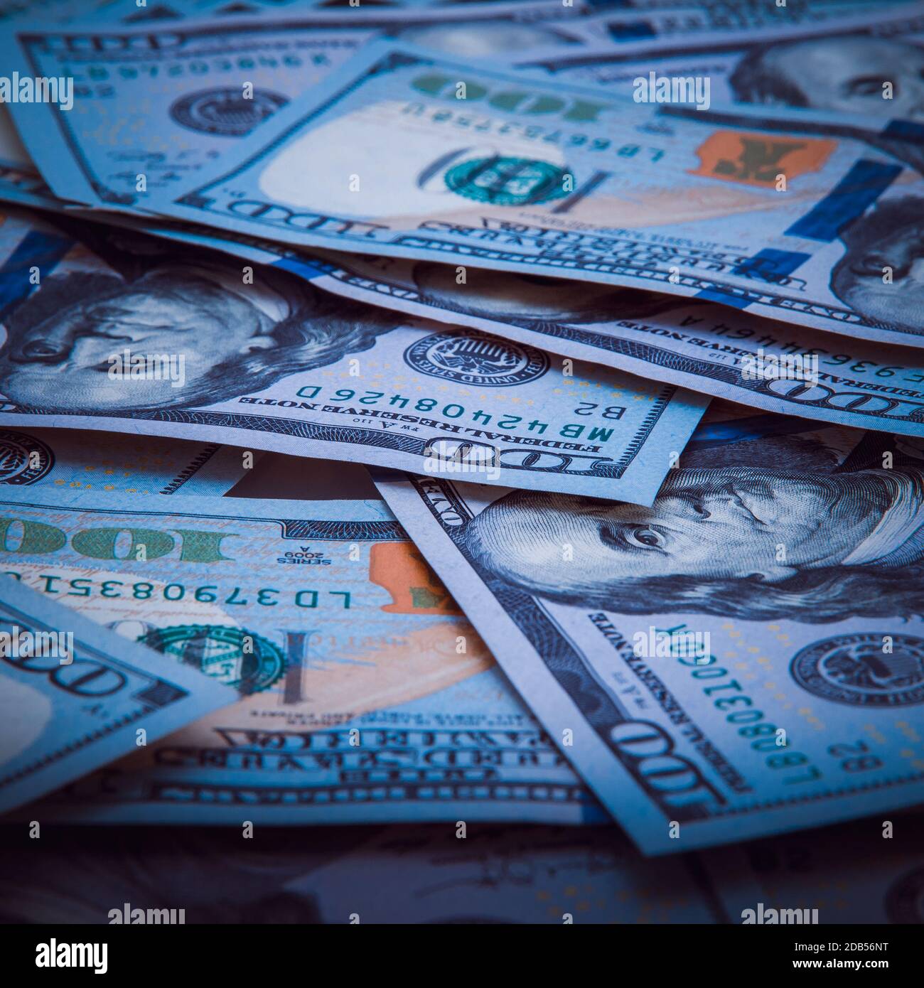 The background of a one hundred dollar bill. Style blue light Stock ...