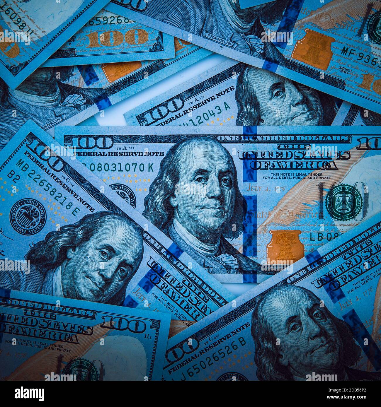 The background of a one hundred dollar bill. Style blue light Stock ...