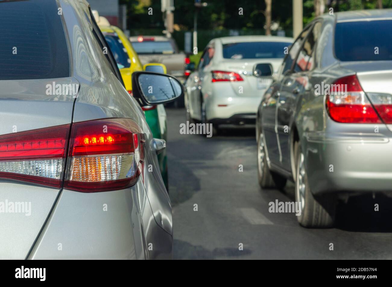 Many cars on the road cause traffic jams during rush hour Stock Photo ...