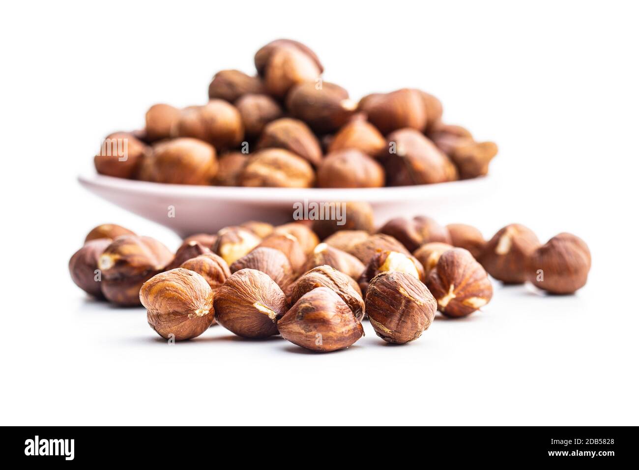 Peeled hazelnuts isolated on white backround Stock Photo - Alamy