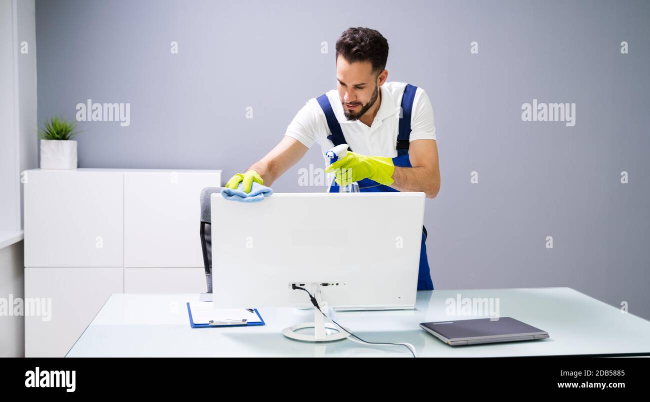 Portrait happy male housekeeper hi-res stock photography and images - Alamy