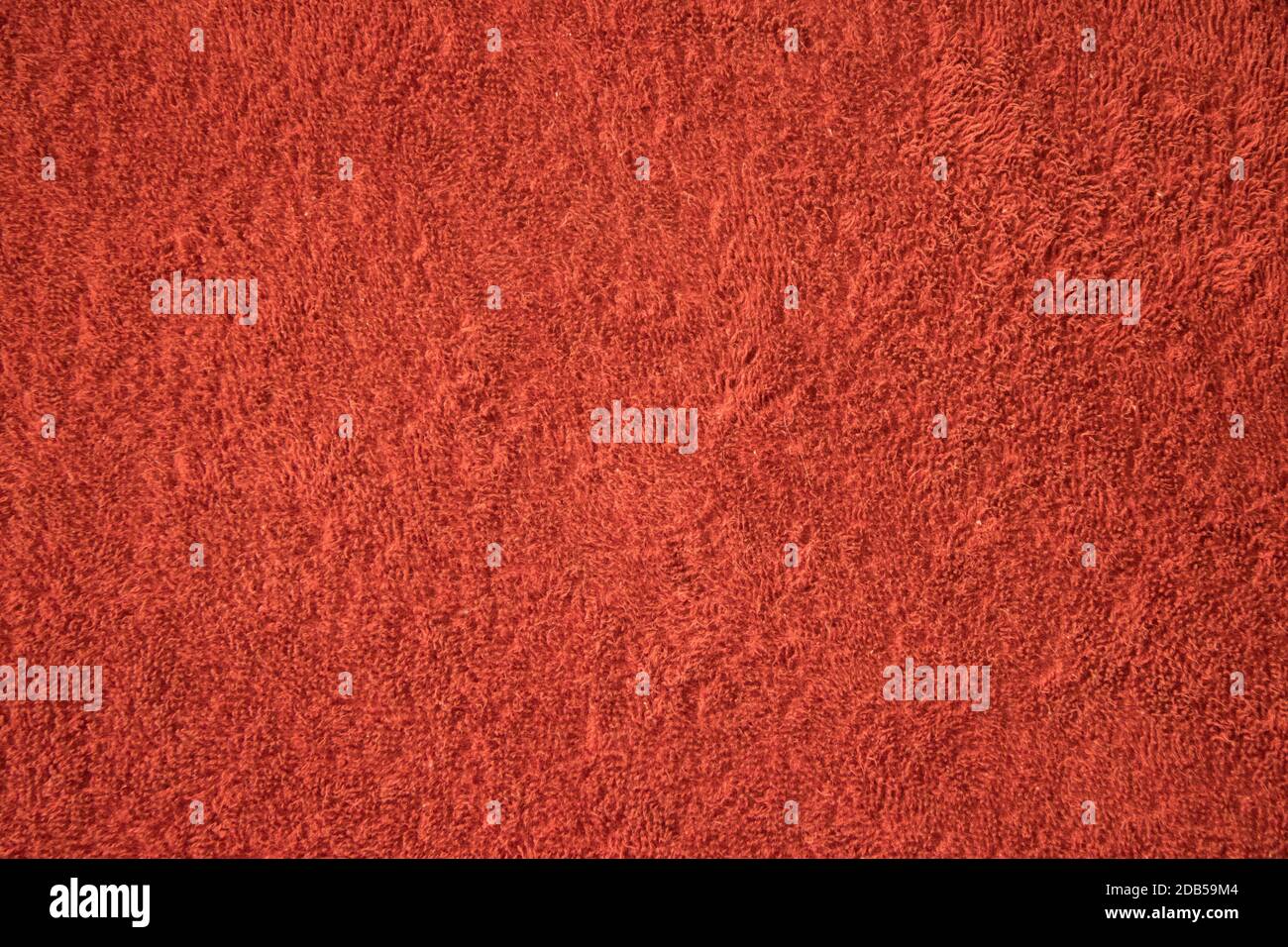 The texture of a terry red towel made of threads Stock Photo - Alamy