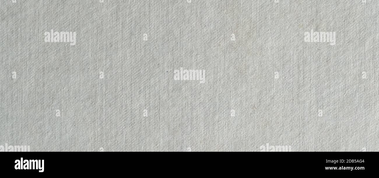 wide off white cardboard texture useful as a background Stock Photo - Alamy