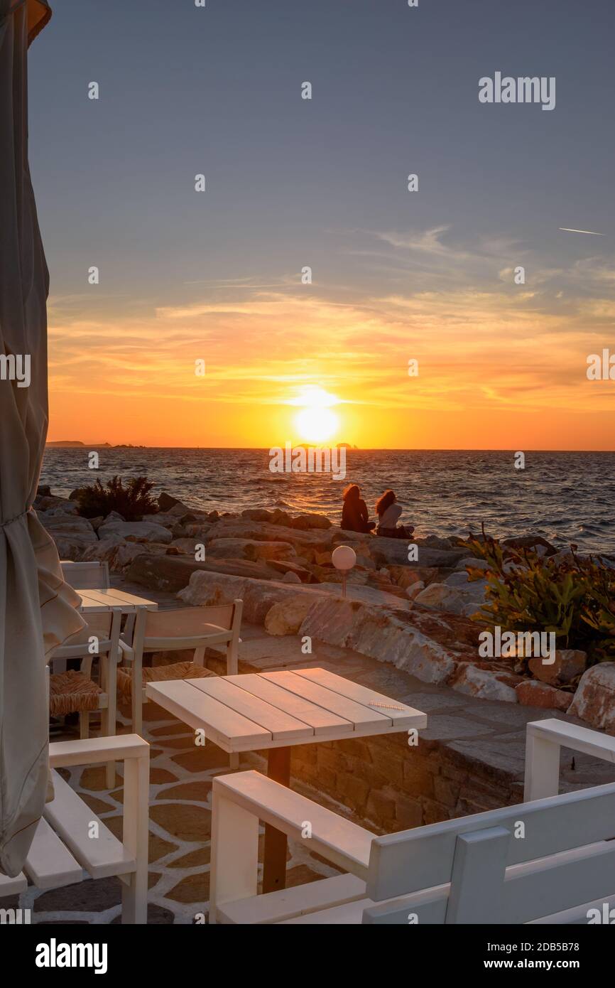 Watching the sunset from Parikia, Paros island Greece Stock Photo - Alamy