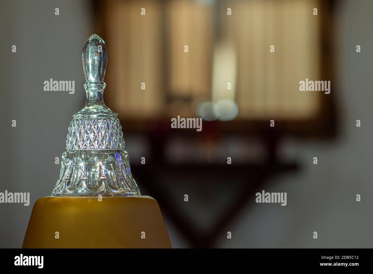 Crystal bell. Glass object Stock Photo - Alamy