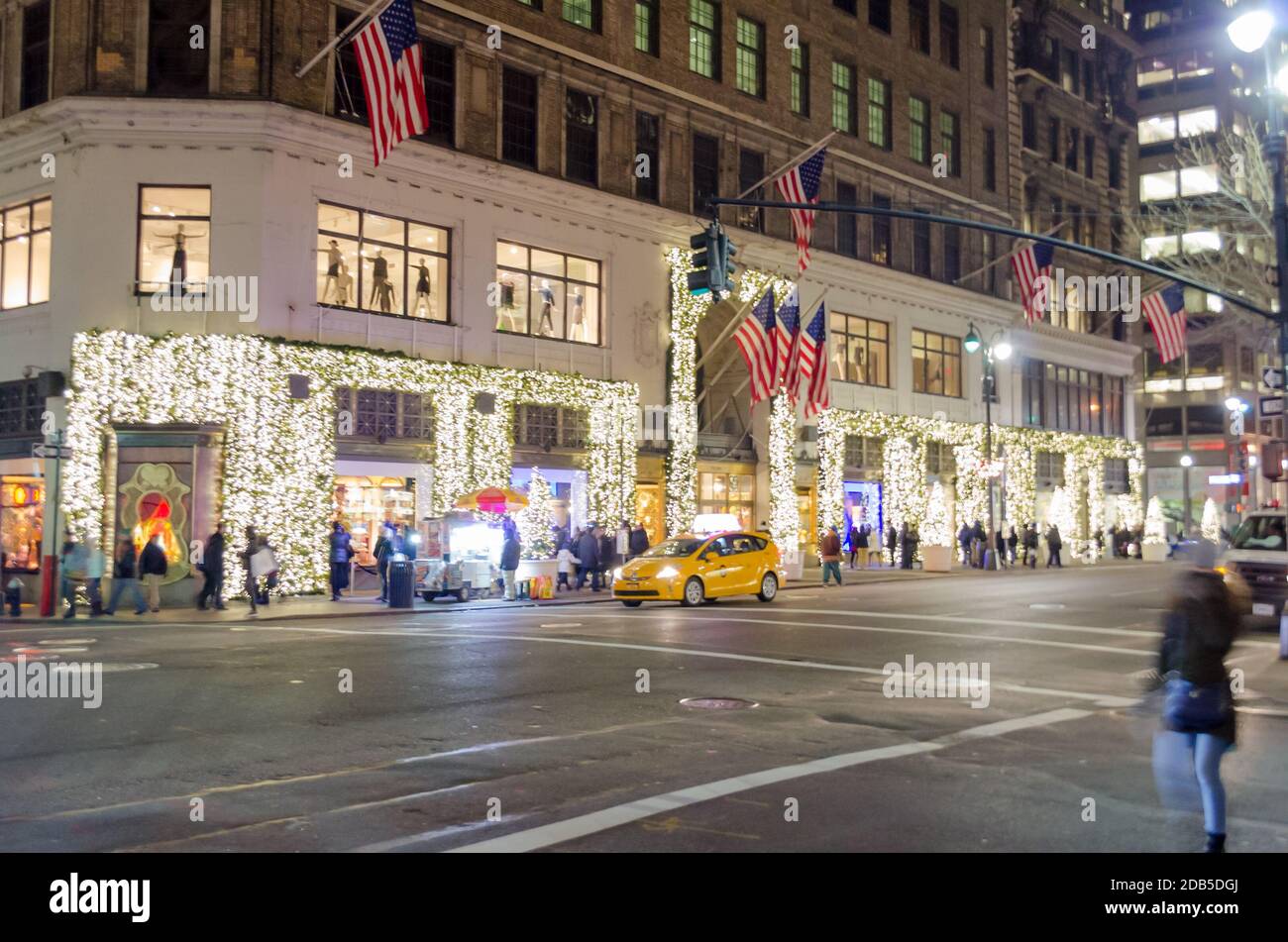 Storefront Christmas Decoration with Bright Lights at Night in ...