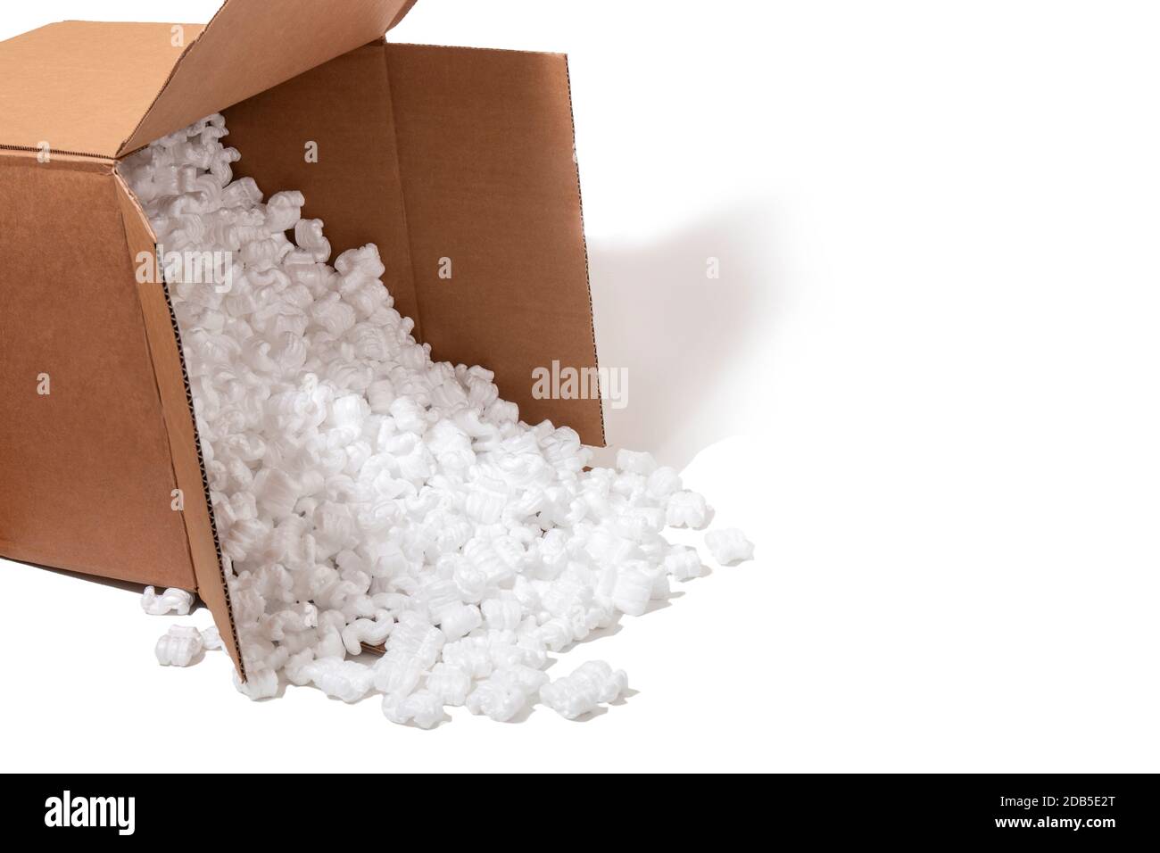 Cardbox spills plenty of polystyrene or white styrofoam packing pieces ...