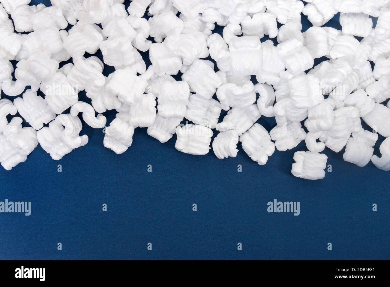 Polystyrene or white styrofoam packing pieces used for minimize bumps ...