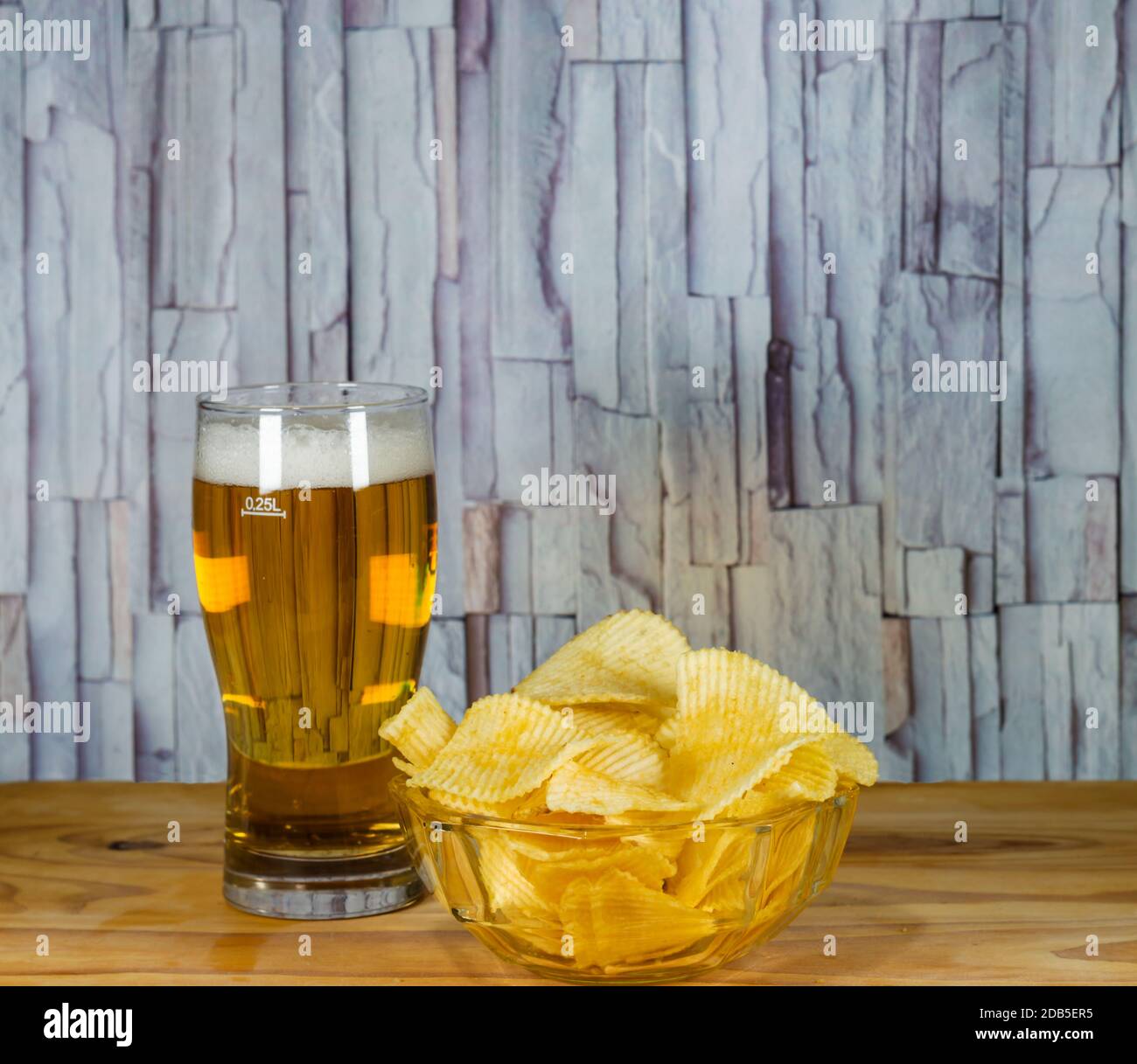 Cold beer snacks and potato chips Stock Photo - Alamy