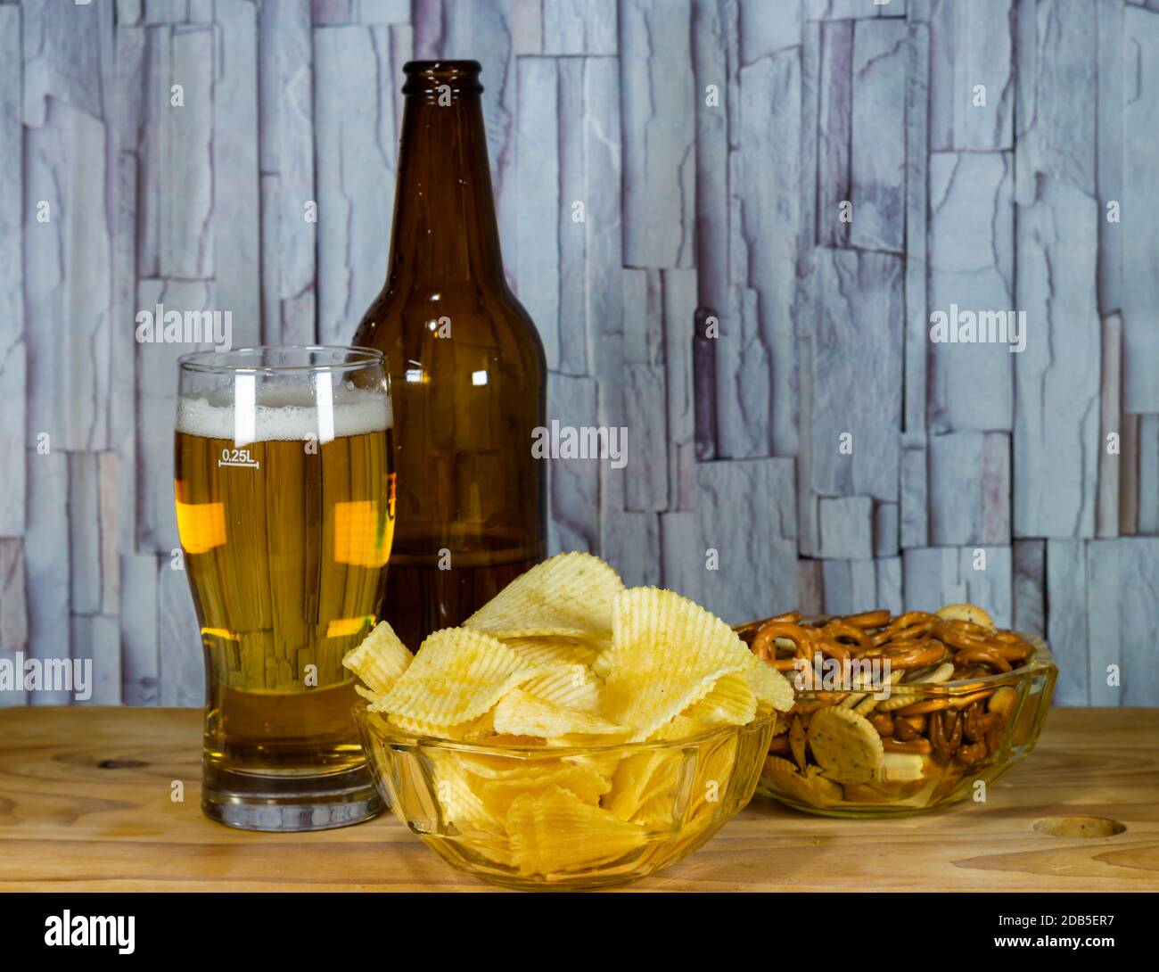 Cold beer snacks and potato chips Stock Photo - Alamy