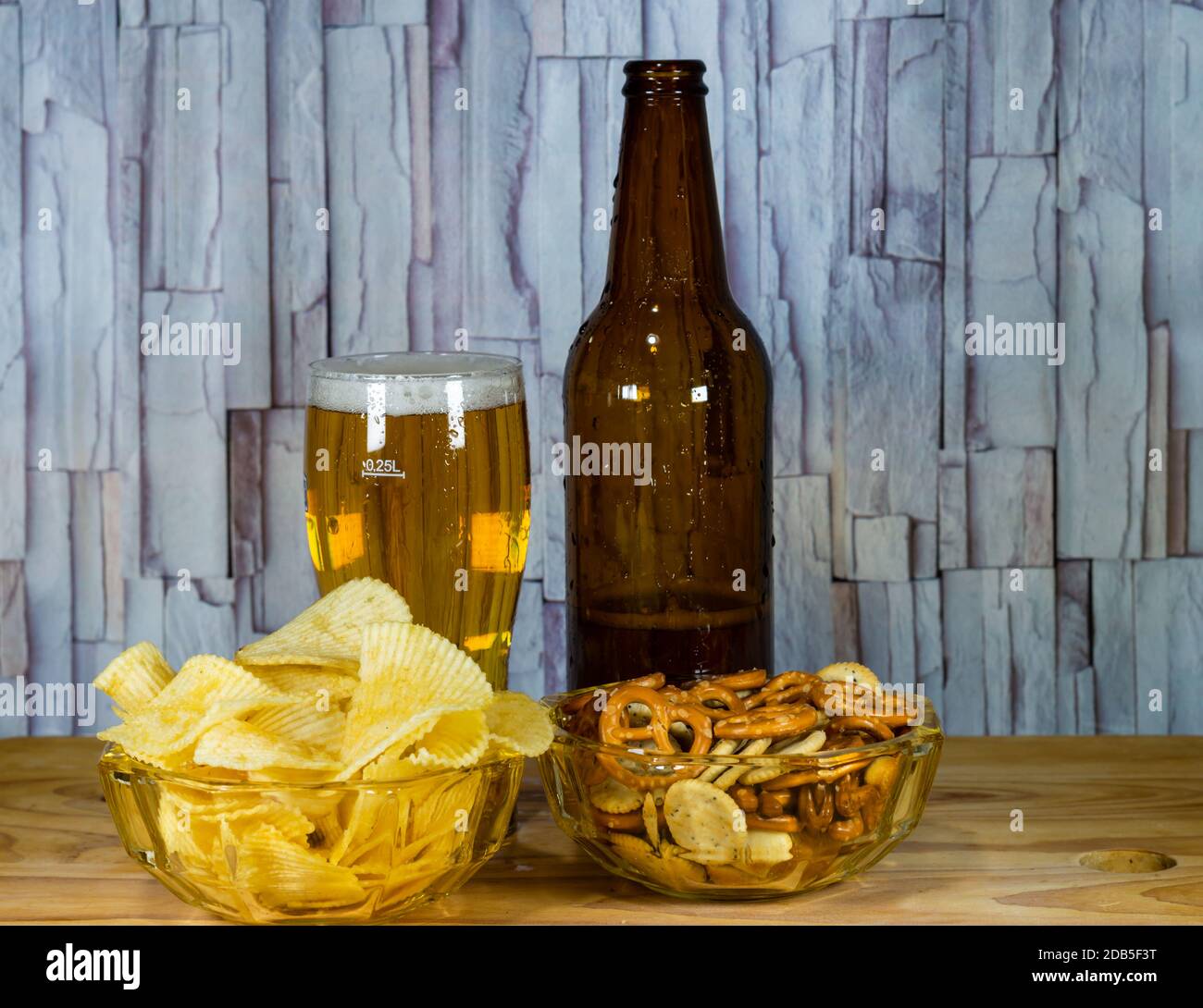 Cold beer snacks and potato chips Stock Photo - Alamy