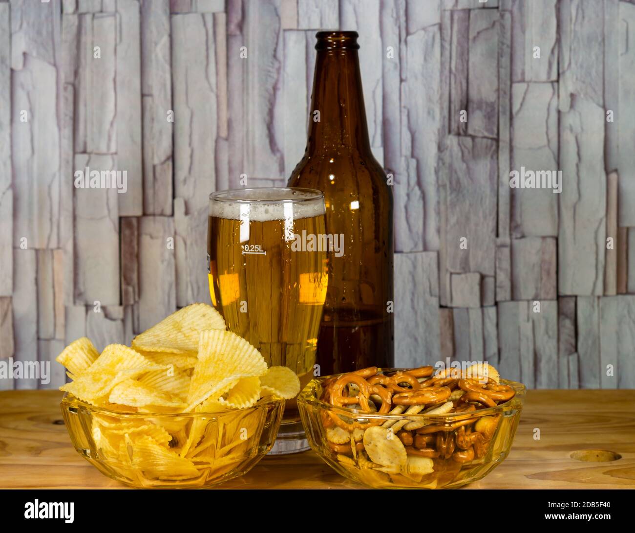 Cold beer snacks and potato chips Stock Photo - Alamy