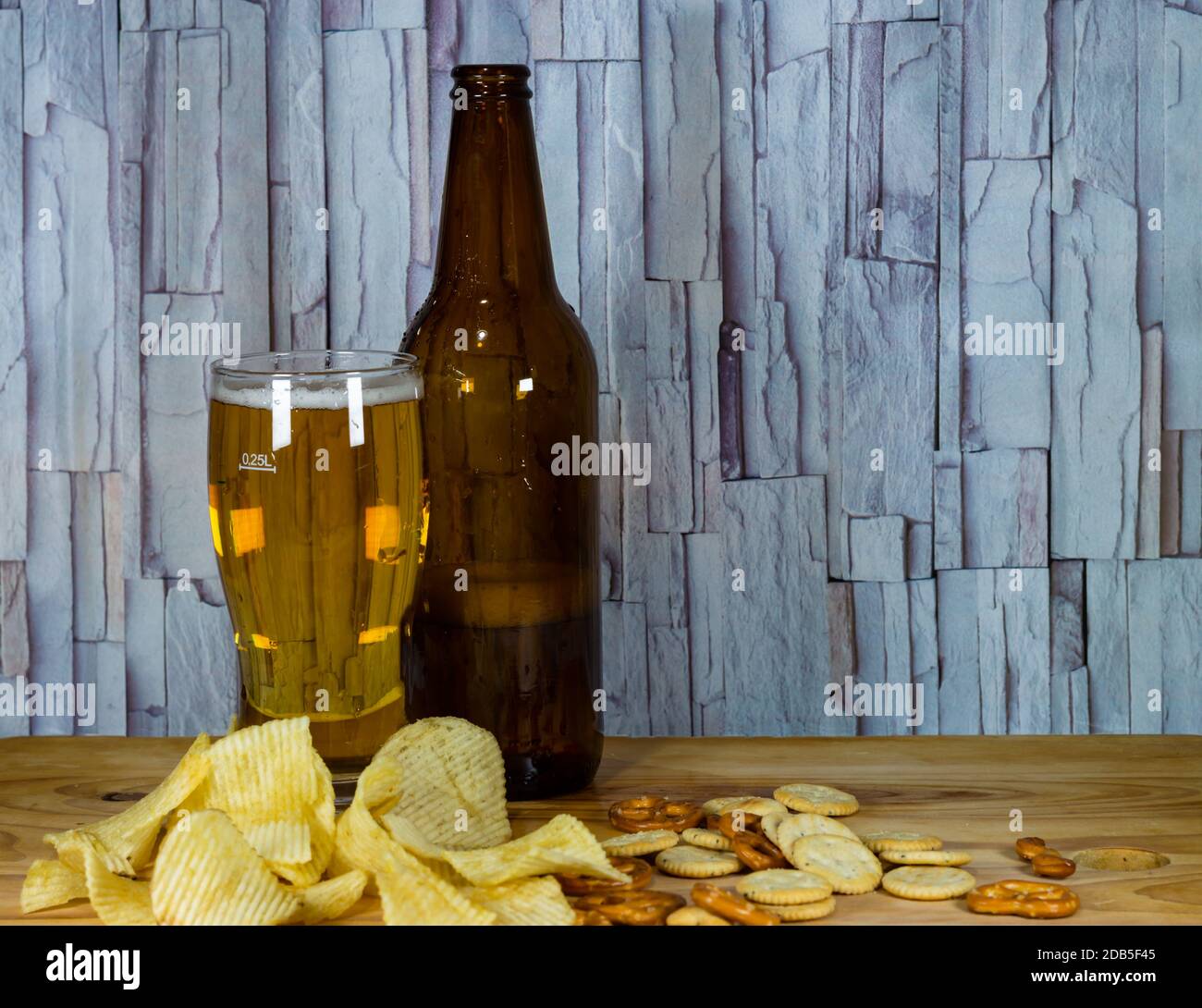Cold beer snacks and potato chips Stock Photo - Alamy