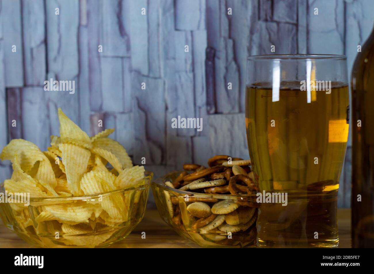 Cold beer snacks and potato chips Stock Photo - Alamy