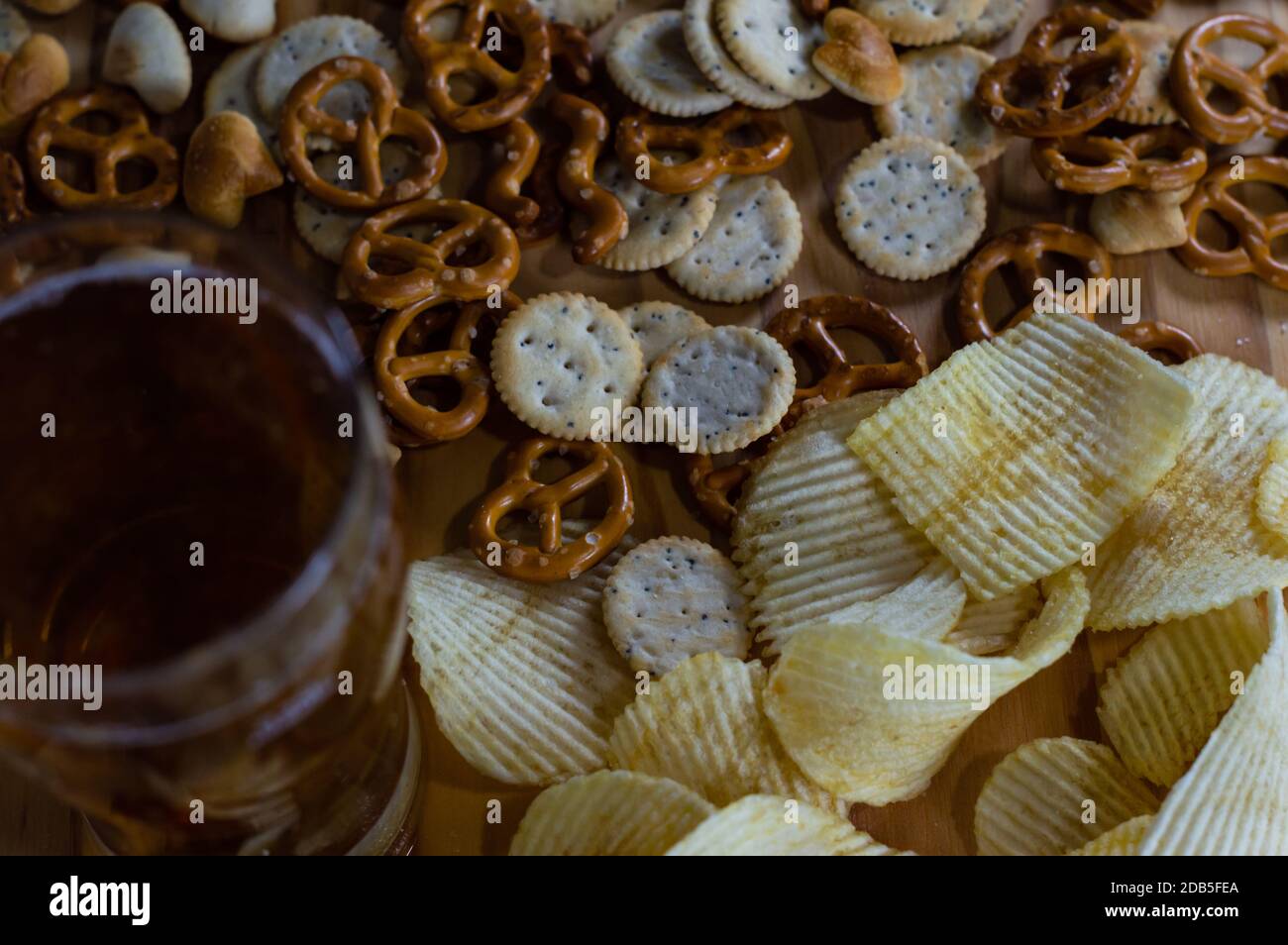 Cold beer snacks and potato chips Stock Photo - Alamy