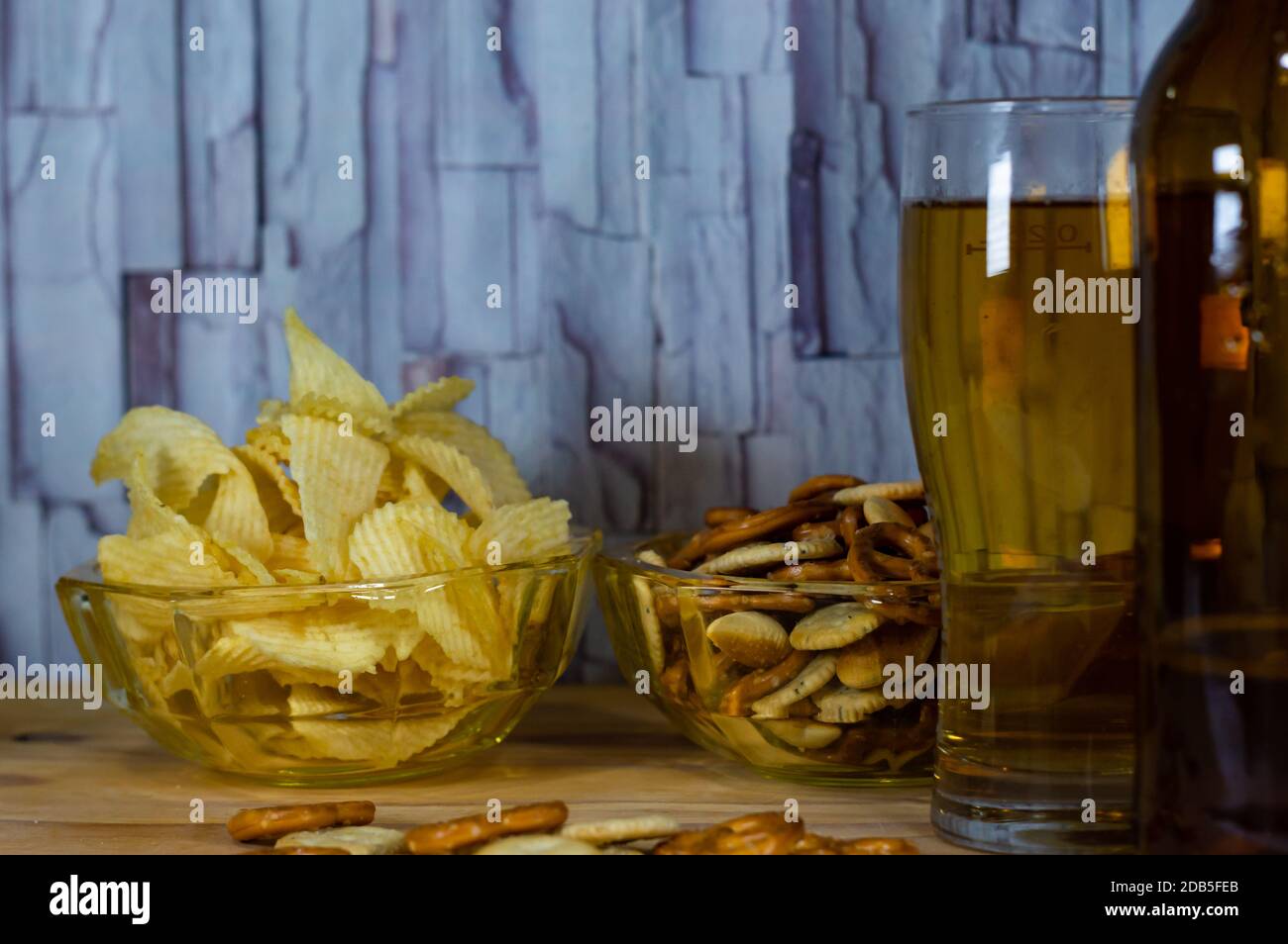 Cold beer snacks and potato chips Stock Photo - Alamy