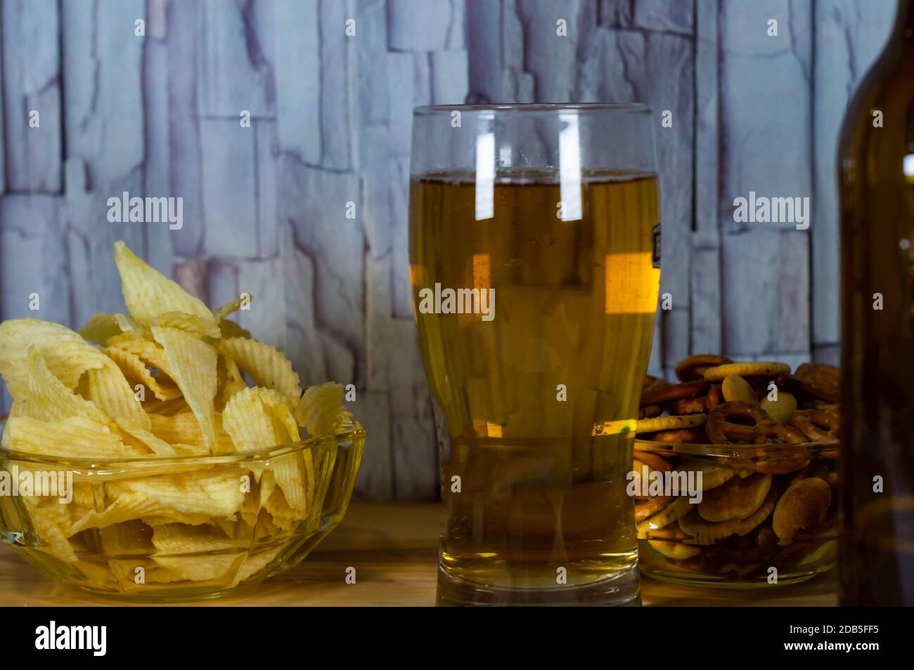 Cold beer snacks and potato chips Stock Photo - Alamy