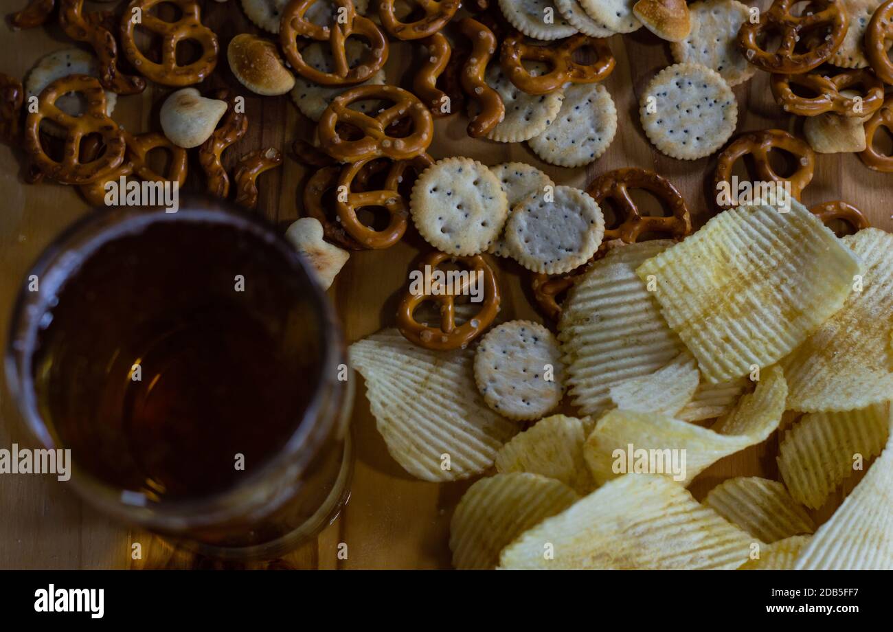 Cold beer snacks and potato chips Stock Photo - Alamy