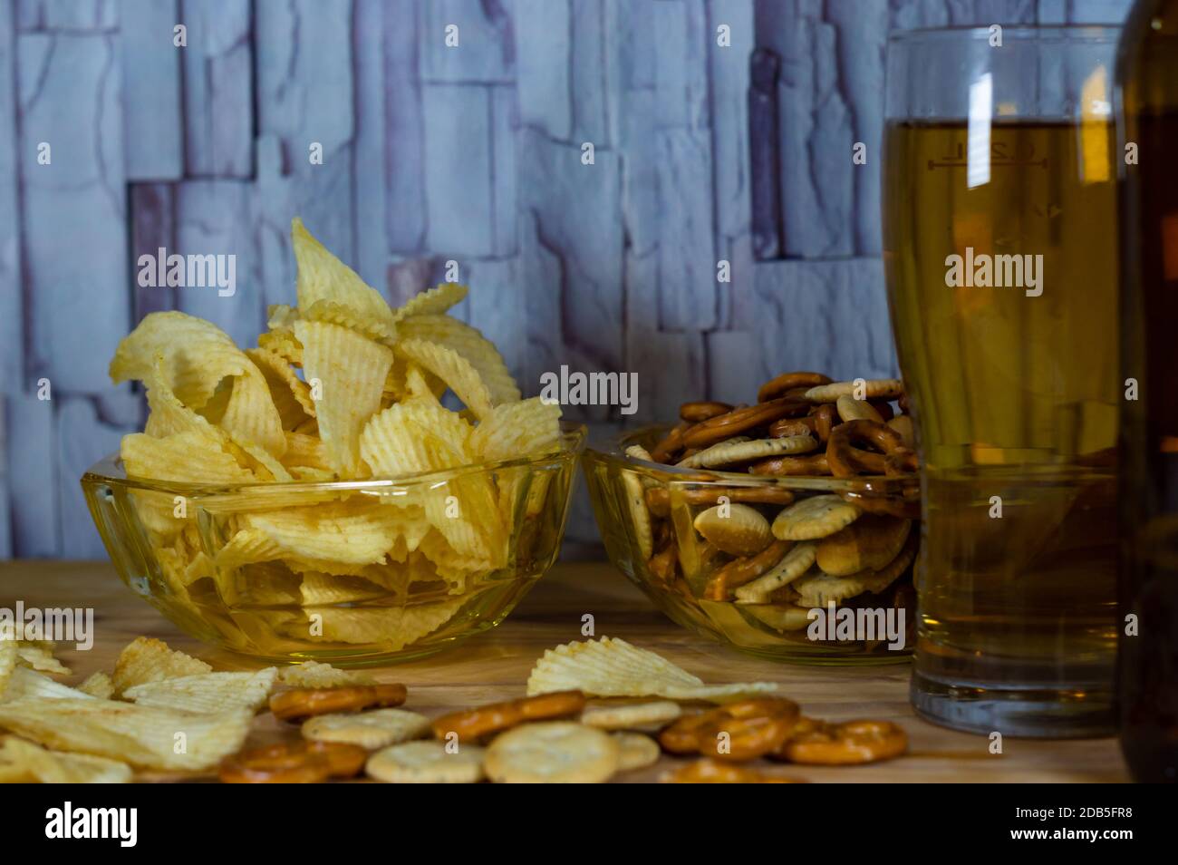 Cold beer snacks and potato chips Stock Photo - Alamy