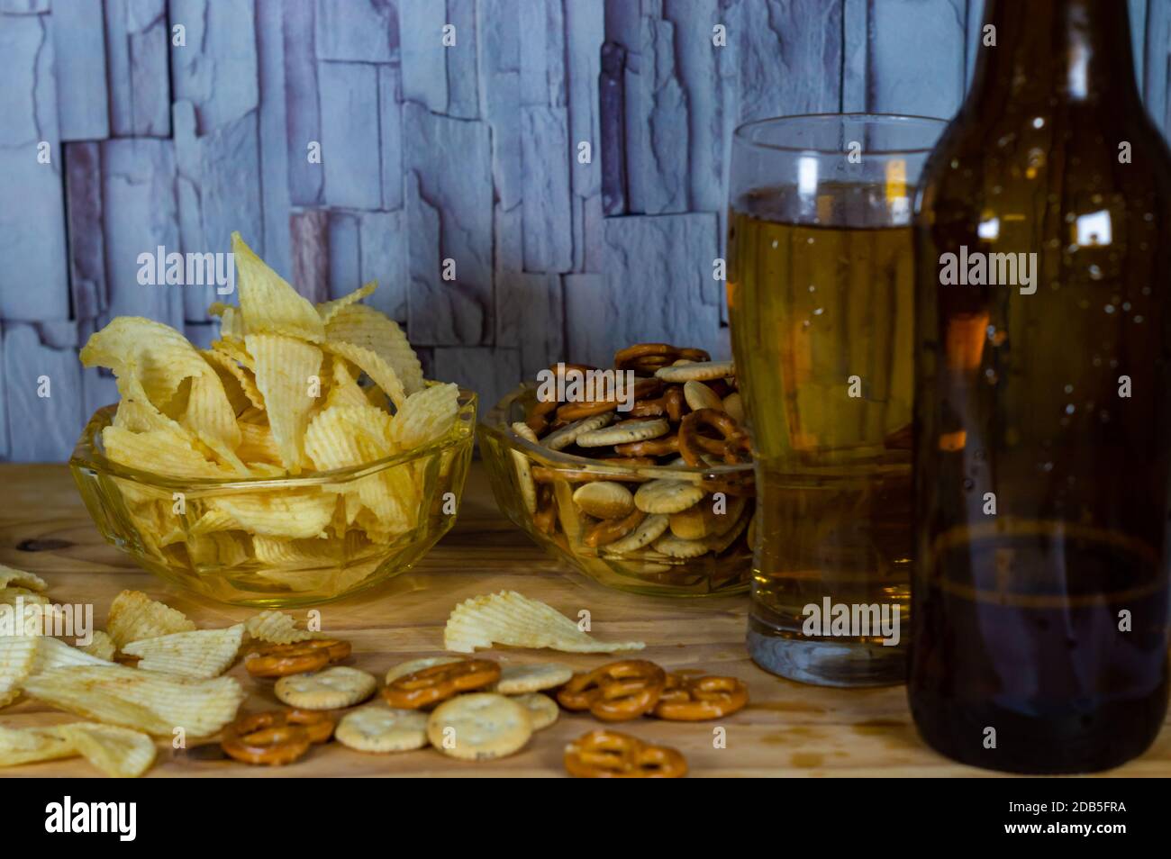 Cold beer snacks and potato chips Stock Photo - Alamy
