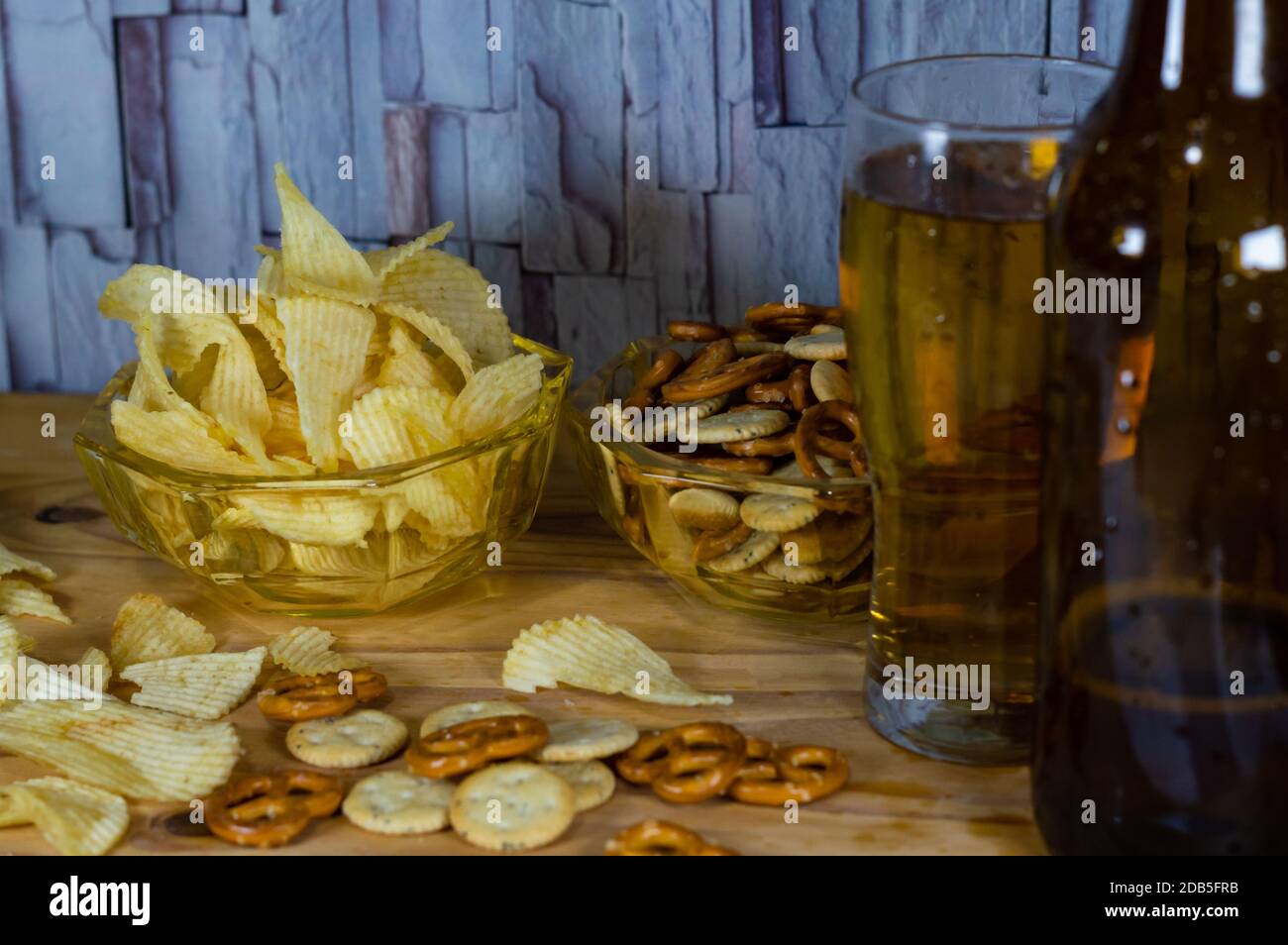 Cold beer snacks and potato chips Stock Photo - Alamy