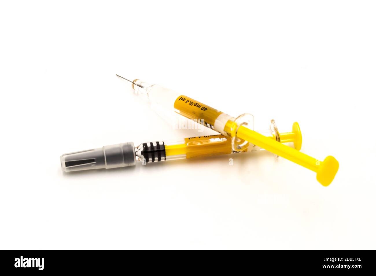 Two syringes close up isolated on white background Stock Photo - Alamy